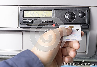 Digital Tachograph And Drivers Hand Inserting The Digital Card In The ...