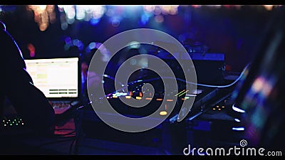 DJ Playing in a Large Trance Party with Large Crowd of People Dancing ...