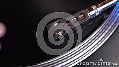 DJ Scratching Vinyl Record on Professional Turntable Player, High Angle ...