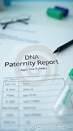 DNA Paternity Test Report Document On A Desk With Laboratory Items ...