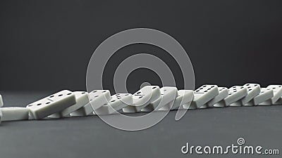 Domino Effect - a Series of Dominoes Falling Down the Chain Grayscale ...