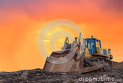 Dozer On Earthmoving At Construction Site On Sunset Background ...