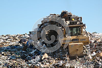 Dozer Pushing Garbage Royalty Free Stock Image - Image: 618016