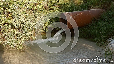 Drain Pipe. Water Flows From A Large Metal Pipe. Sand Pit Drainage ...