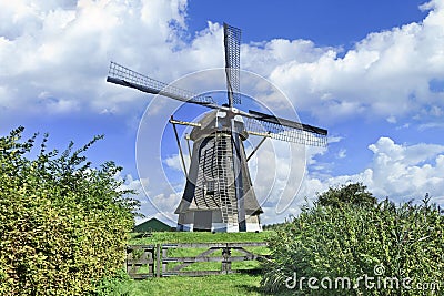 Drainage Windmill With Thatched Roofing In A Polder With Dramatic ...