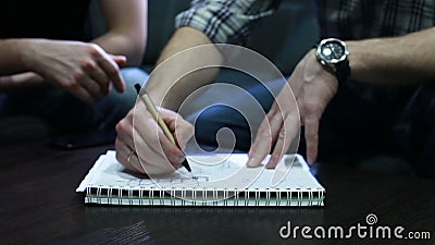 Drawing Draft. Hands of Young People Who Draw a Draft with Pen on ...