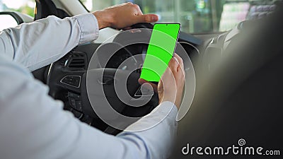 Driver Using a Smartphone Inside the Car. Chromakey Smartphone with ...