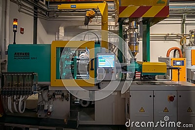 Plastic Injection Molding Machine In The Process Of Creating A Brick ...