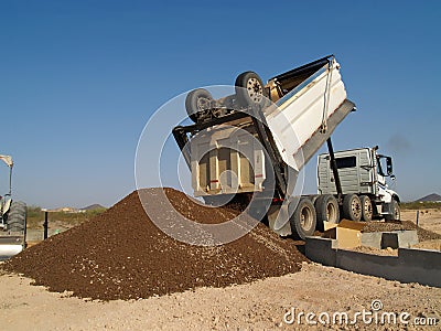 Dump Truck Backed Up Dumping Dirt Stock Images - Image: 5985254