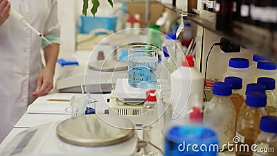 Dye Dissolution in a Beakers in Modern Laboratory Stock Footage - Video ...
