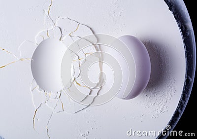 An Egg Lying On White Plaster Or Starch. Cracks And Surface Texture ...