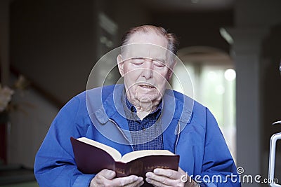 Elderly Man Reading The Bible Royalty Free Stock Photos - Image: 25678388