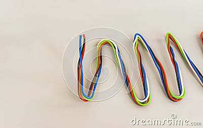 Electric Wires Of Different Colors In Curved Form On A Gray Background ...