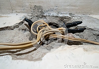 Electrical Wires Sticking Out Of The Ruined Wall Stock Photo ...