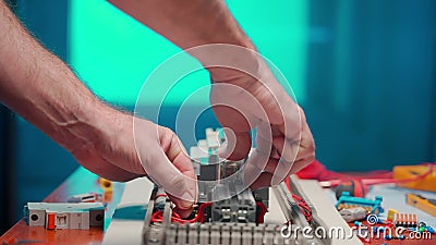 An Electrician Installs a Relay with Electromagnetic Coils of Direct ...