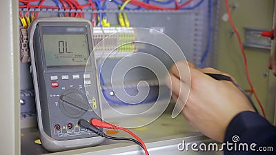 Electrician Testing Electrical Power. Industrial Factory Electrician ...
