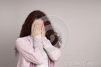 Embarrassed Young Woman Hiding Her Face Royalty-Free Stock Image ...