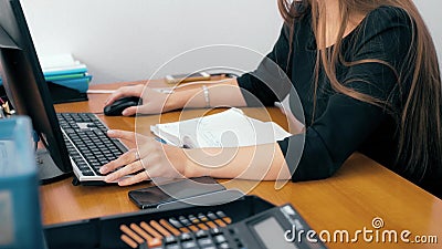 Employee Working on Computer in Office. Scrolling through a ...