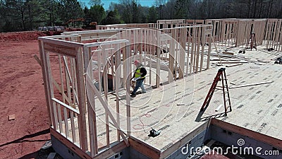 Engineers Checking the Leveling Quality of Wooden Beams Using a Level ...