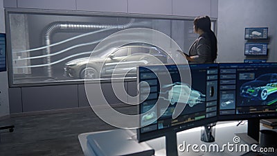 Engineers Testing the Aerodynamic Properties of a Car in a Laboratory ...