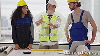 Engineers Using Blueprint of Project Plan Brainstorming and Working ...