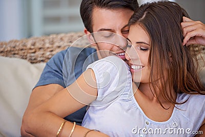 Enjoying Some Cuddles. A Loving Married Couple Cuddling And Being ...