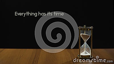 Everything Has Its Time, Wise Phrase about Patience, Sand Flowing in ...
