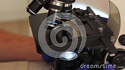 Examination of Liquid with on Glass Under a Microscope Stock Video ...