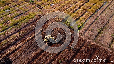 Excavator Dig Ground at Construction Site. Aerial View of a Wheel ...