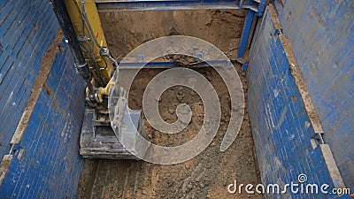 The Excavator Operator Selects the Soil from the Trench, the Walls of ...
