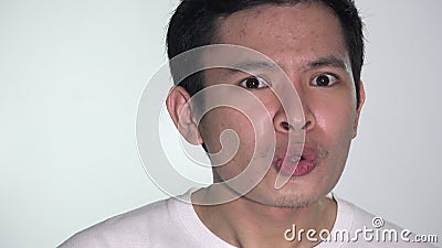Excited Asian Man Funny Faces Isolated Stock Footage - Video of ...
