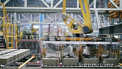 Factory Products are Being Relocated by Modern Industrial Robot Stock ...