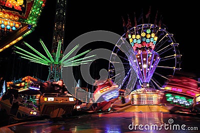 Fair With Spinning Rides Stock Image - Image: 21414451
