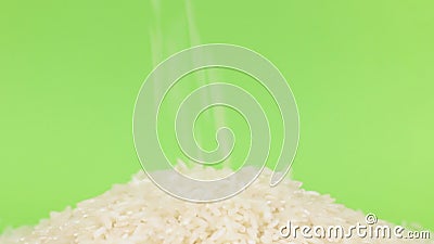 Falling Grains Rice on Heap of Rice on a Green Screen Stock Video ...