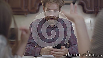 The Family of Three People Having Breakfast. Busy Father Have a Call ...