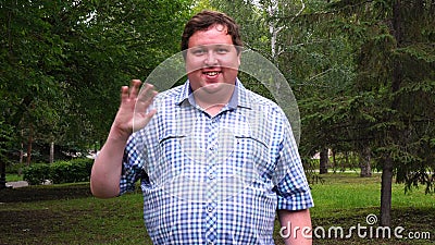 Fat Man with Checkered Shirt Saluting with Hand with Happy Expression ...