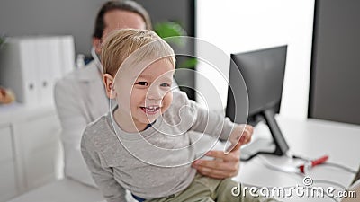 Father and Son Doctor Examining Child at Clinic Stock Video - Video of ...