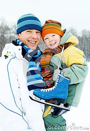 Father And Son Go Ice Skating Stock Image | CartoonDealer.com #12792541