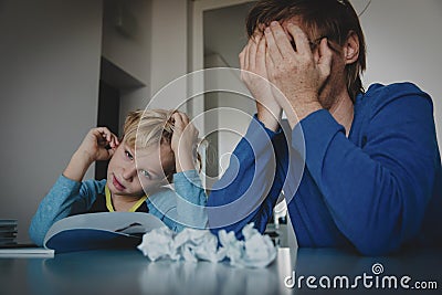 Father Tired Of Doing Homework With Son, Difficult Learning Royalty ...