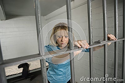 Female Criminal Behind Bars Stock Photography - Image: 29663172