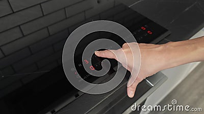 Female Hand Includes an Electric Stove. Modern Technology. Touch Panel ...