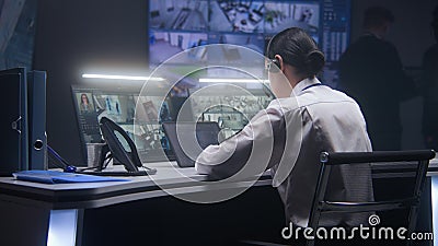 Female Officer Controls CCTV Cameras Using Tablet Stock Video - Video ...