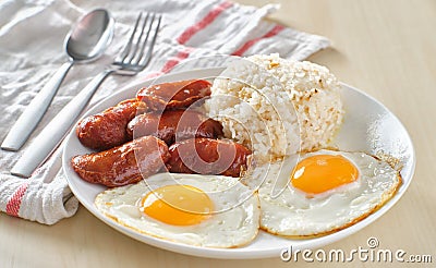 Filipino Silog Breakfast With Garlic Fried Rice, Longsilog, And Two ...