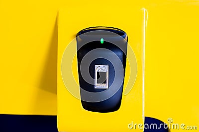Finger Biometric Scanner With Blurry Finger On Yellow Machine Royalty ...