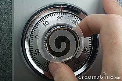 Fingers Turning Safe Dial Stock Photos - Image: 21531693