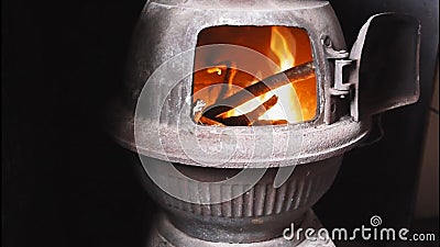 Fire in a pot belly stove stock footage. Video of flames - 130643822