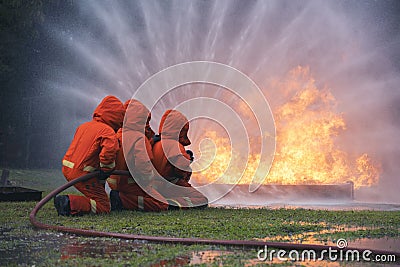 Firefighter Rescue Team Training In Fire Fighting Extinguisher ...