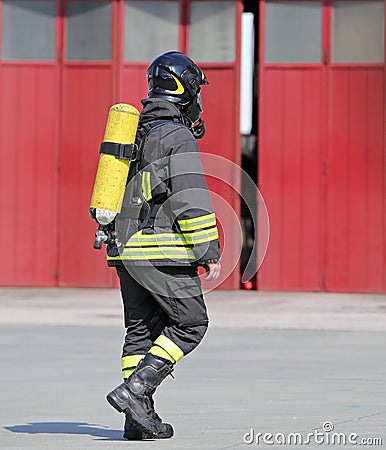 Fireman With Oxygen Tank To Breathe During Fire Royalty-Free Stock ...
