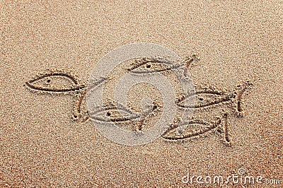 Fishes Drawn On A Beach Sand Royalty Free Stock Photography - Image ...