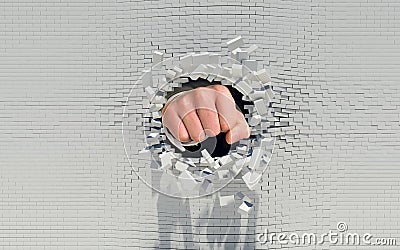 Fist Punching Through A Brick Wall Stock Photo - Image: 43777575